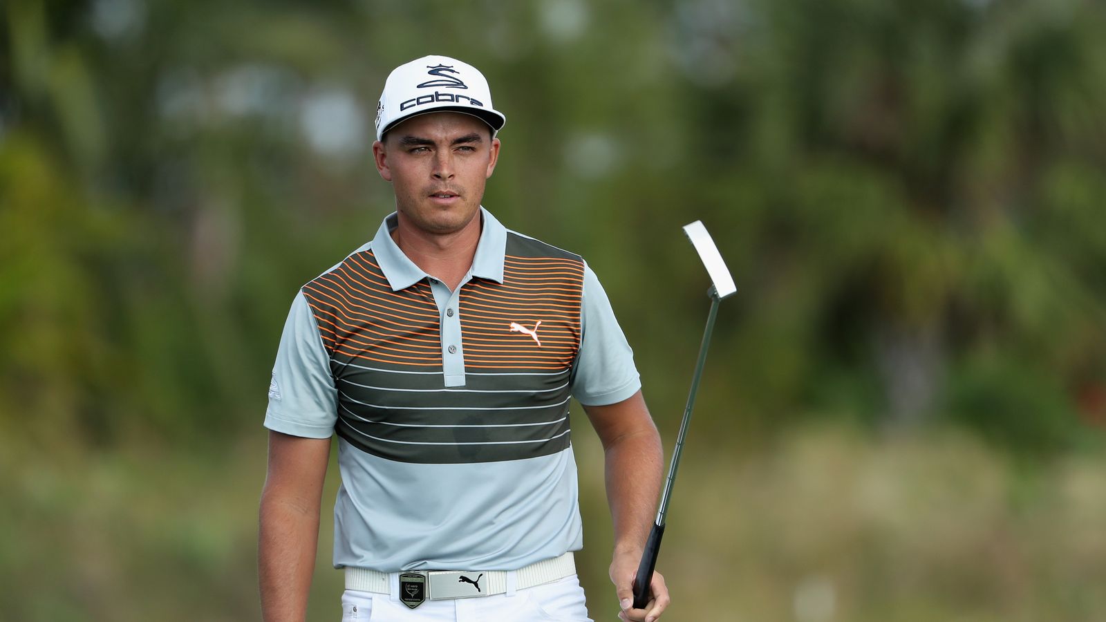 Rickie Fowler keeps shoes on to play shot from water in the Bahamas ...