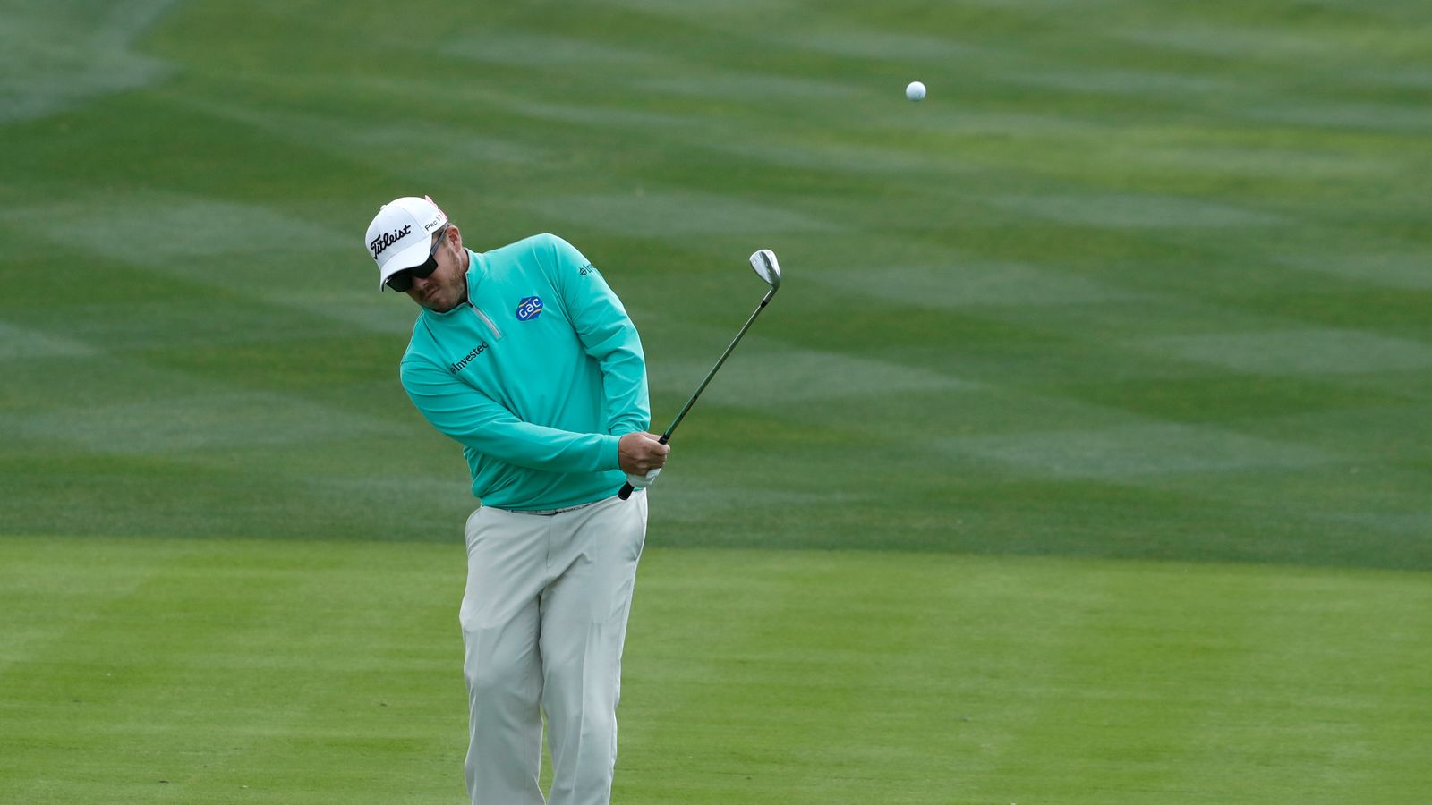 George Coetzee leads after strong winds cause suspension in Dubai ...