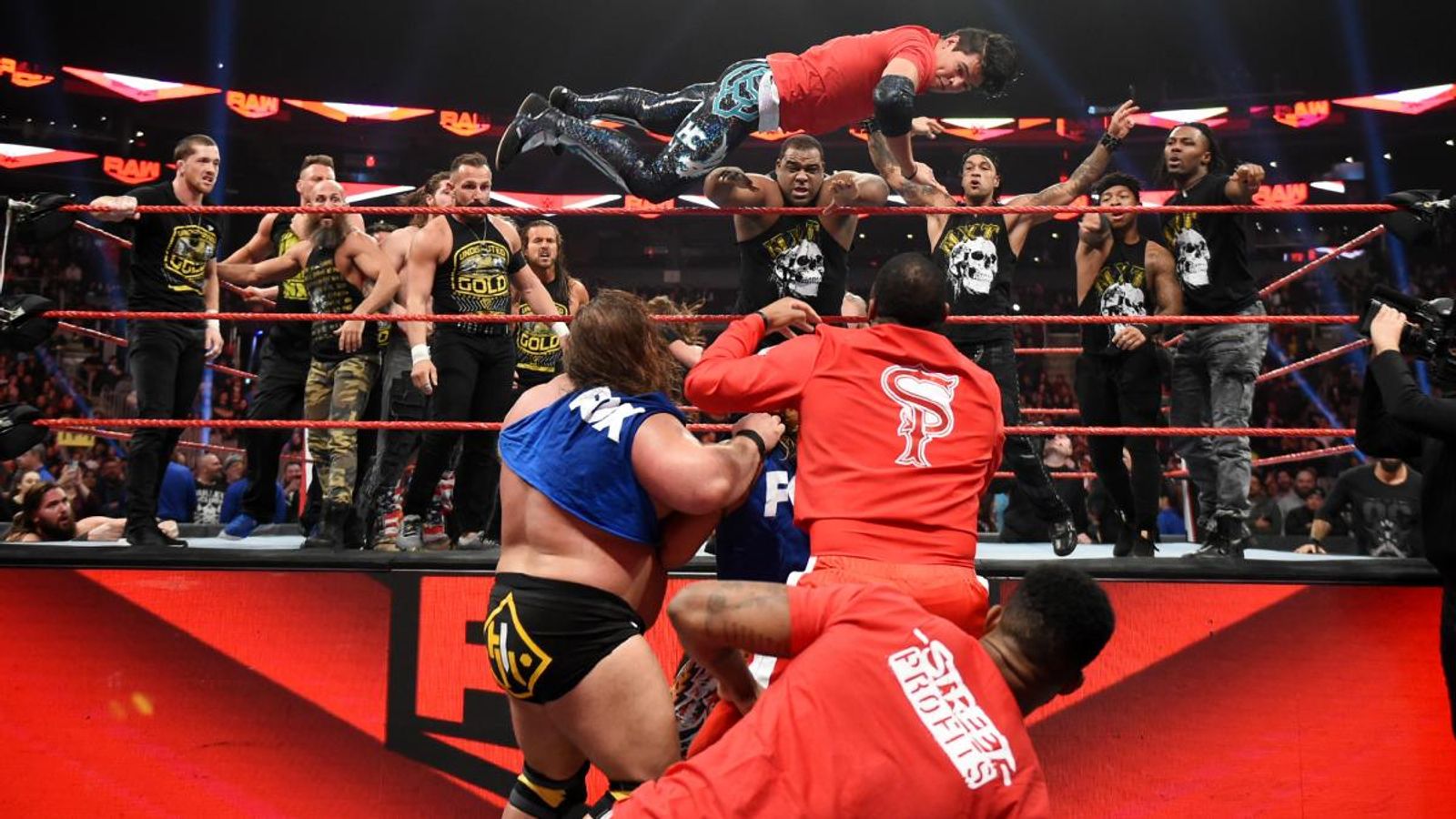 WWE Raw ends in chaotic three-way brawl as NXT and SmackDown invade ...
