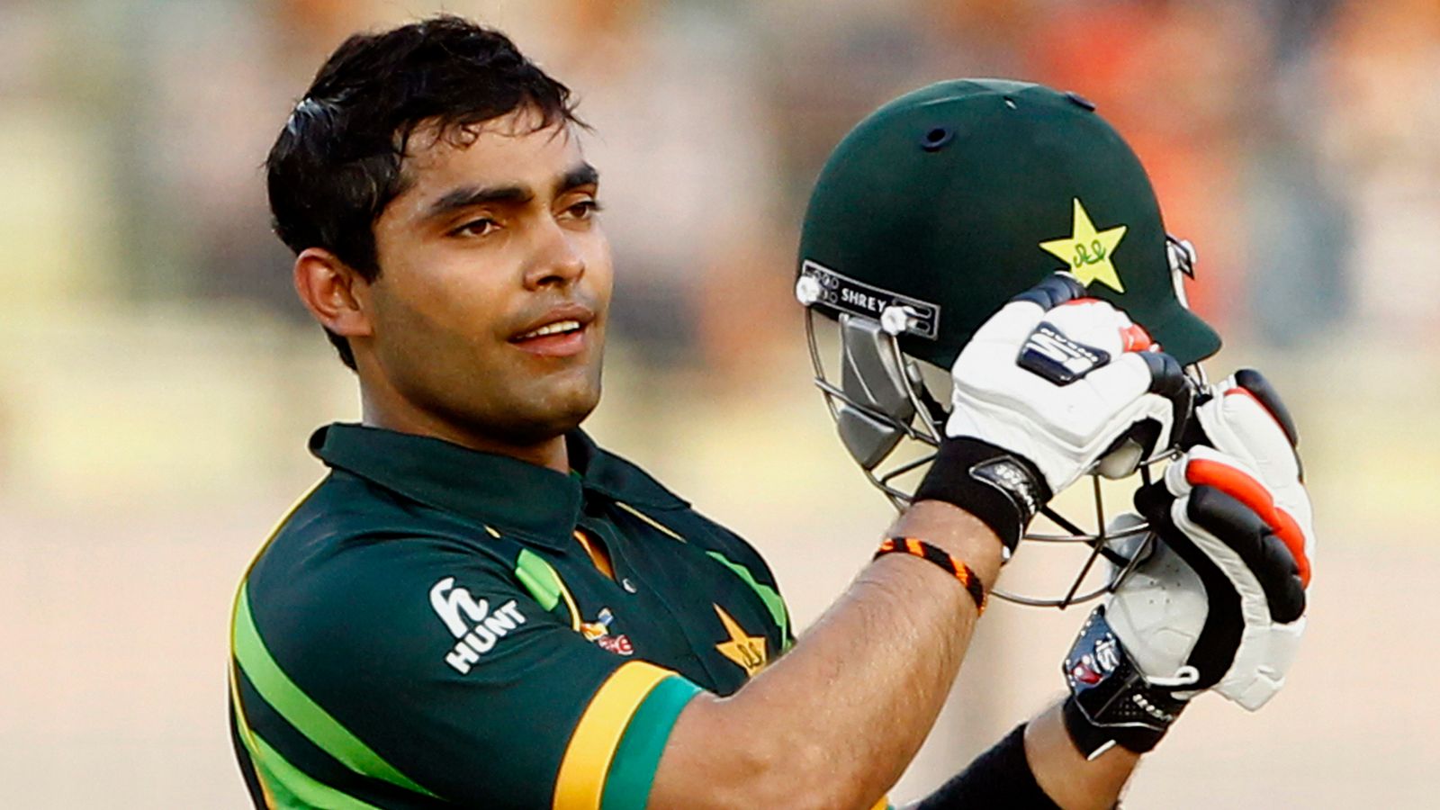 Pakistan batsman Umar Akmal can return to cricket after ban cut from 18 months to one year ...